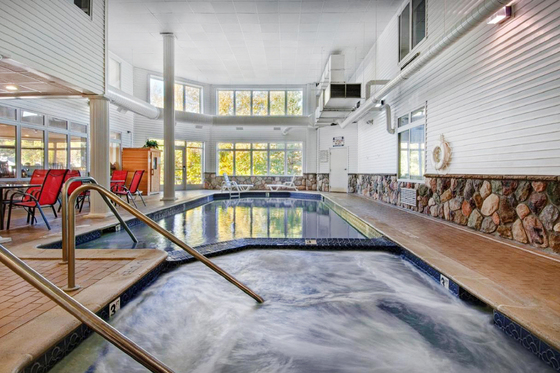 Cherry Tree Inn & Suites: Pool & Spa Day Pass Traverse City | ResortPass